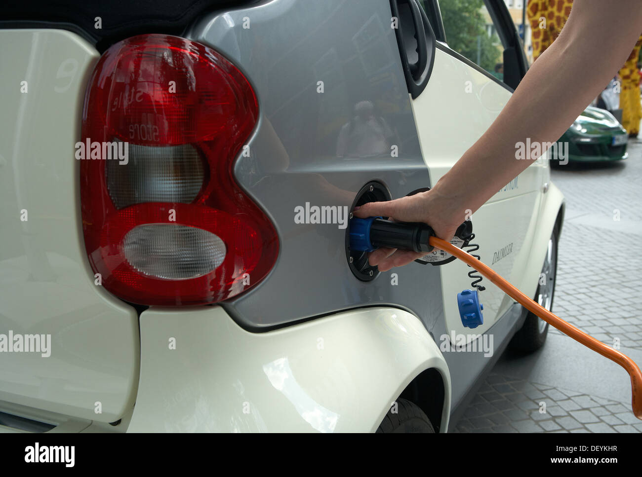 Berlin, Germany, is an electric Smart car is charged with RWE Power ...