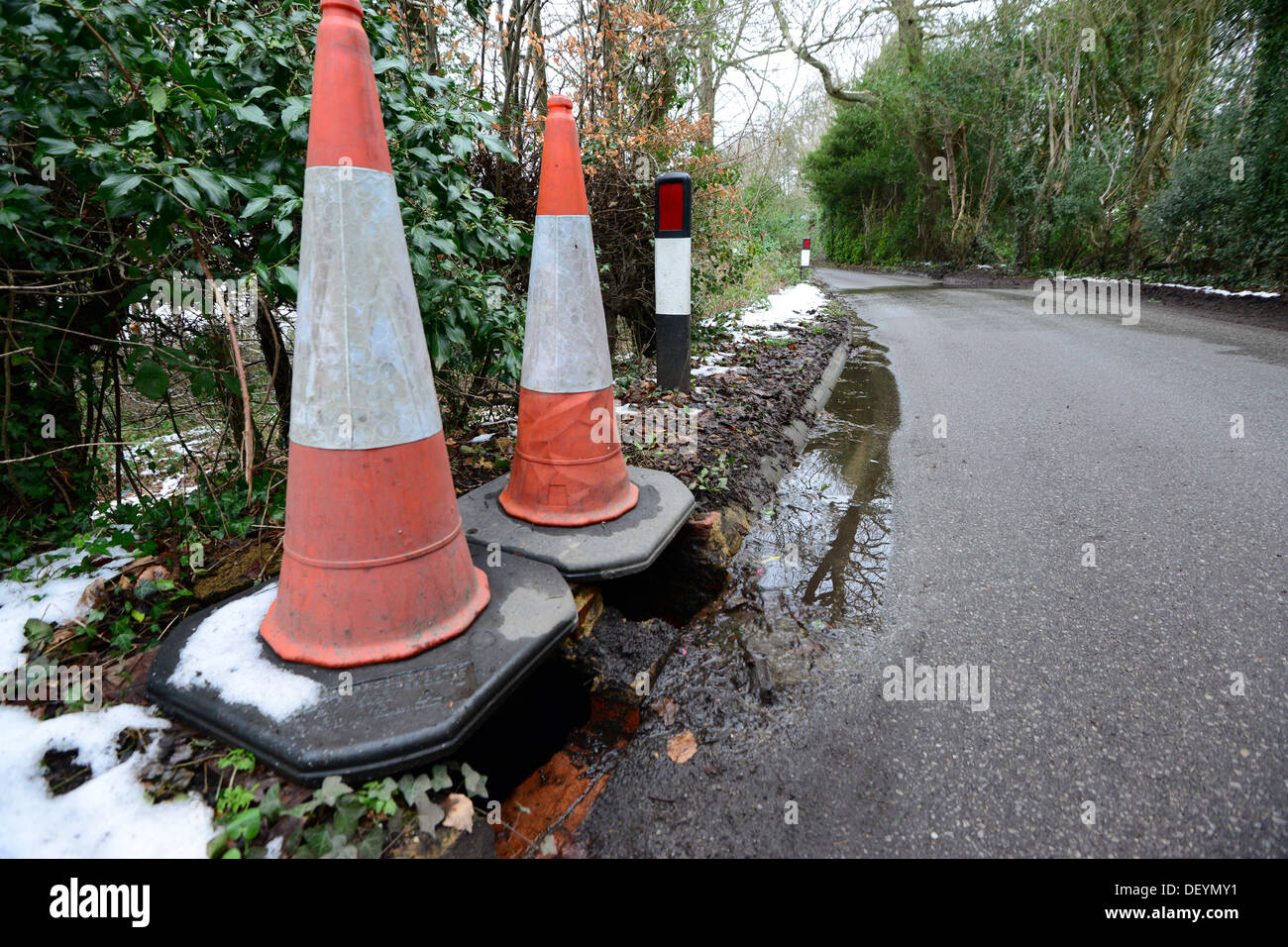 Roadside drain cover theft Stock Photo - Alamy