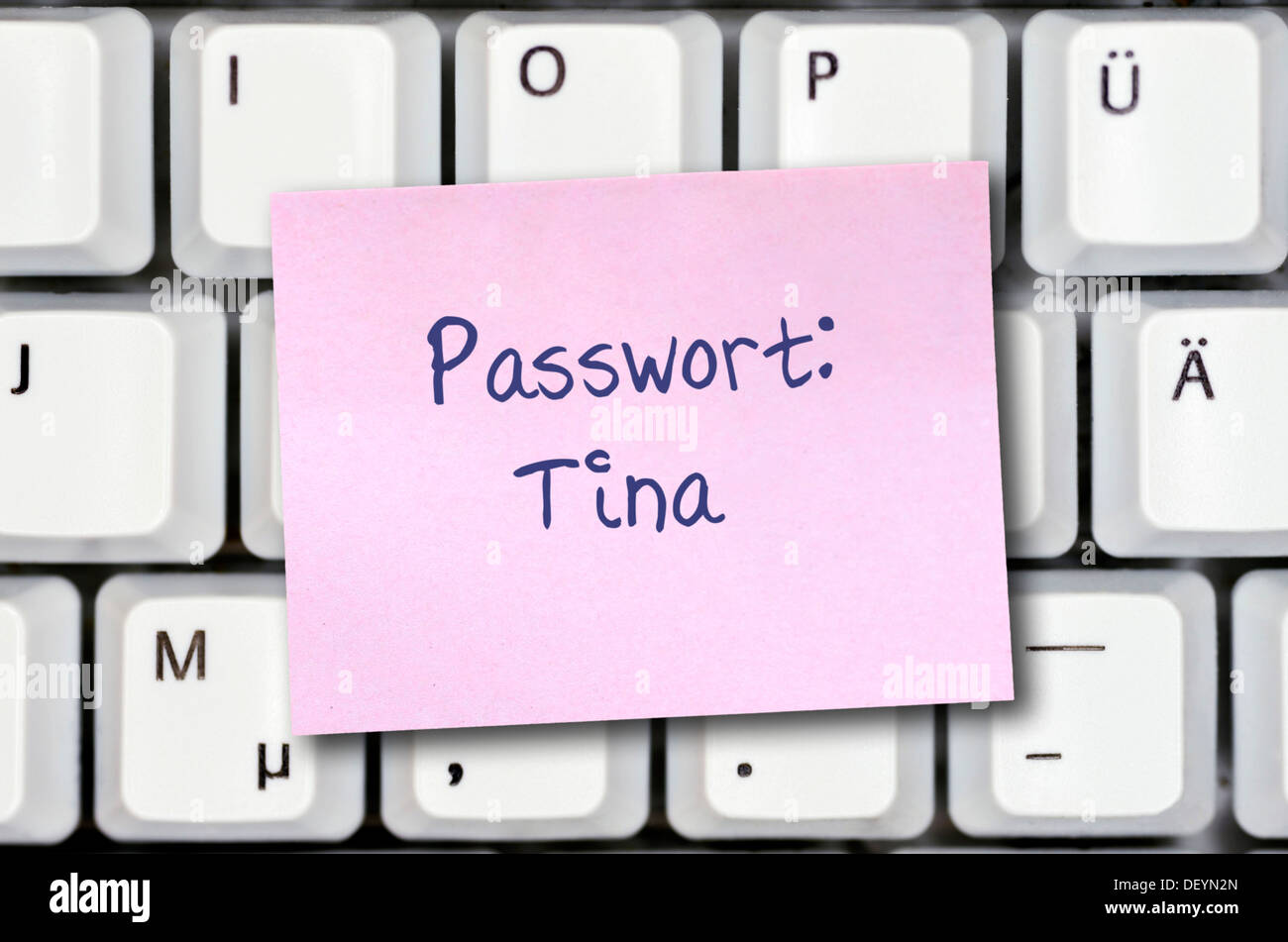 Note on a computer keyboard, password Tina, an insecure password Stock ...