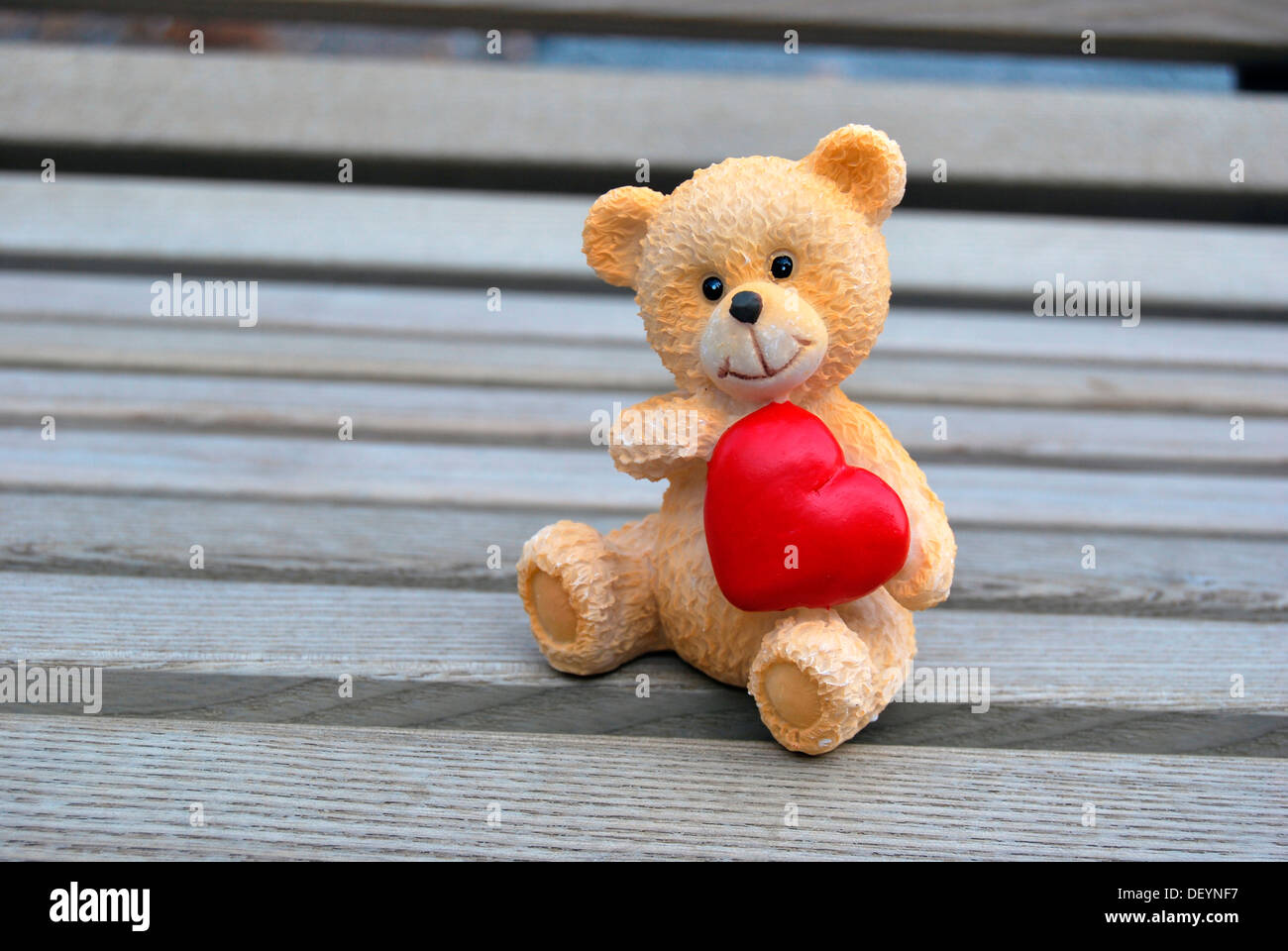 Teddy with heart Stock Photo - Alamy