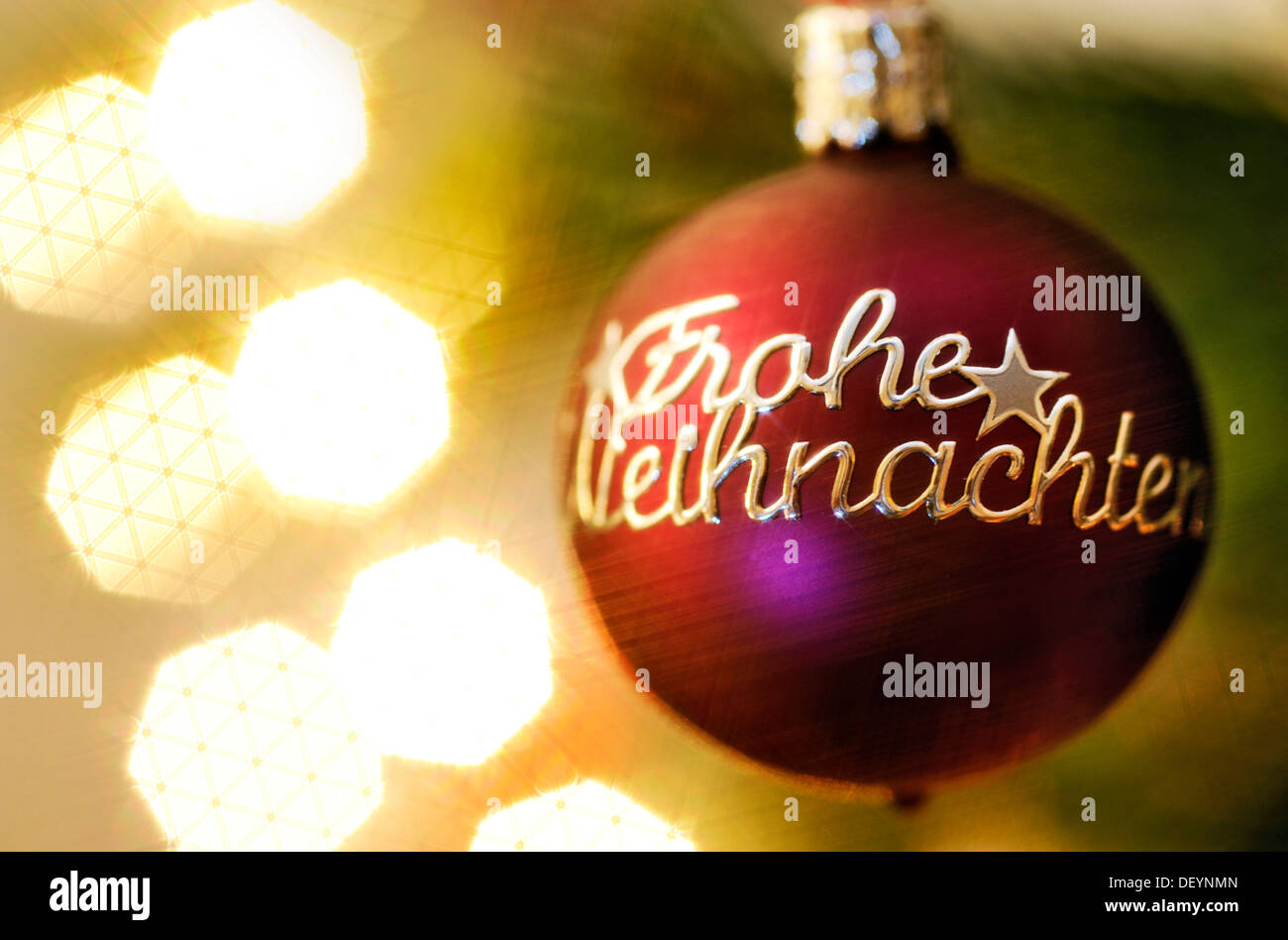Christmas tree ball on a Christmas tree, lettering "Frohe Weihnachten ...