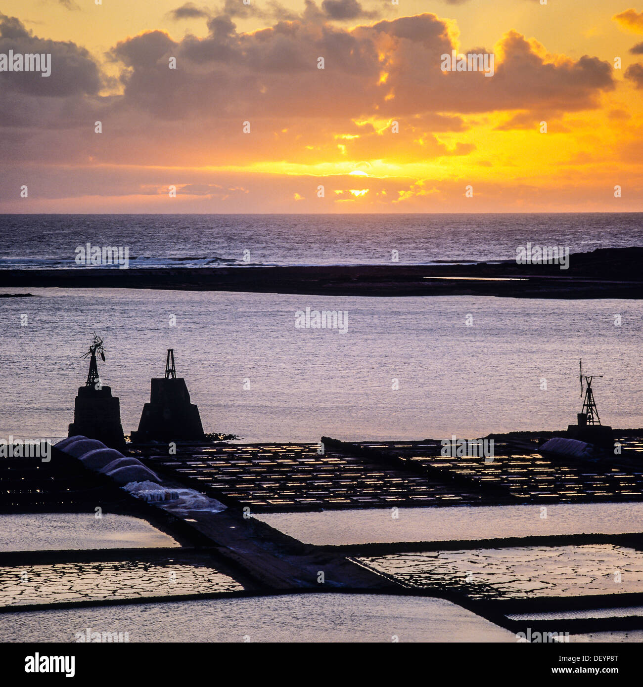 Salt pans at Salinas de Janubio salt works at sunset Lanzarote Canary ...