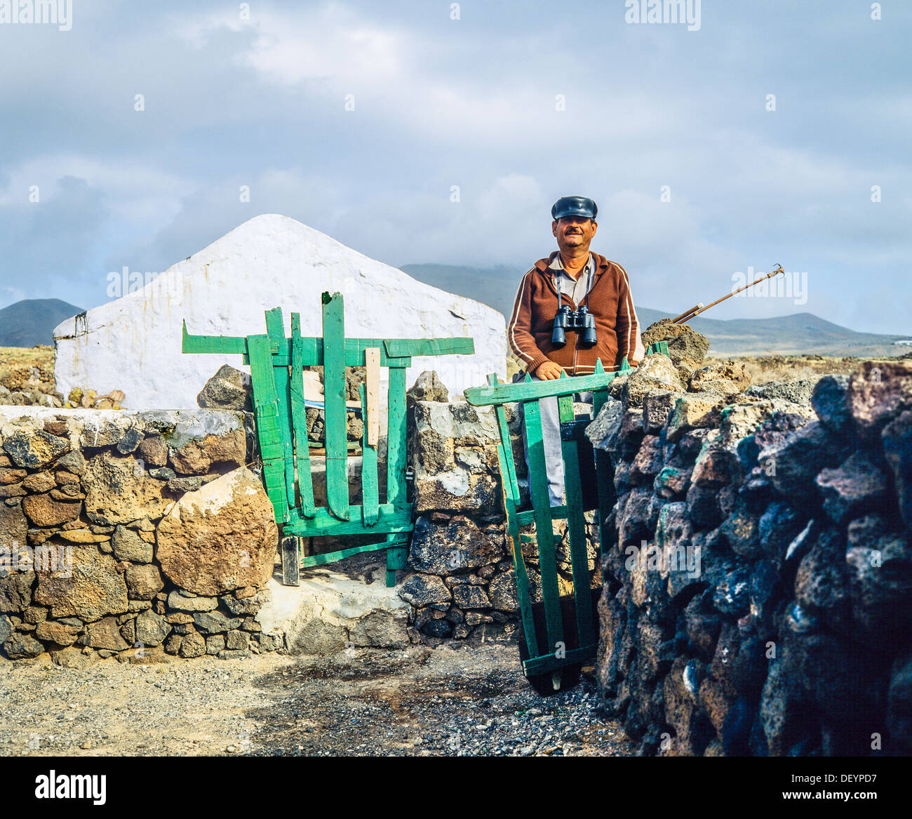 1 person standing front house hi-res stock photography and images - Alamy