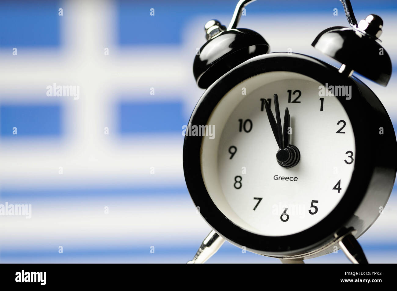 Five to twelve on an alarm clock display in front of Greek national ...