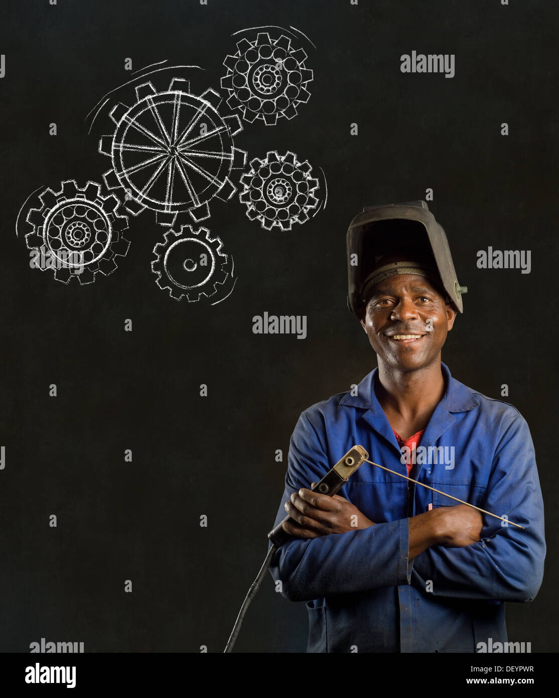 African American black man industrial worker with chalk gears on a ...