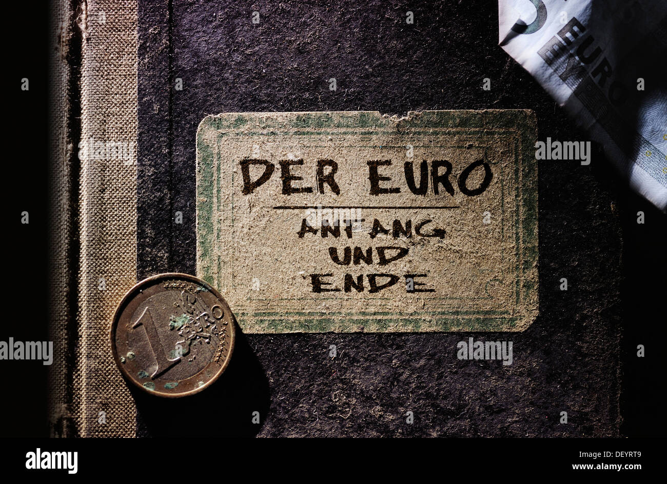 Old book with the inscription, Der Euro – Anfang und Ende, German for ...