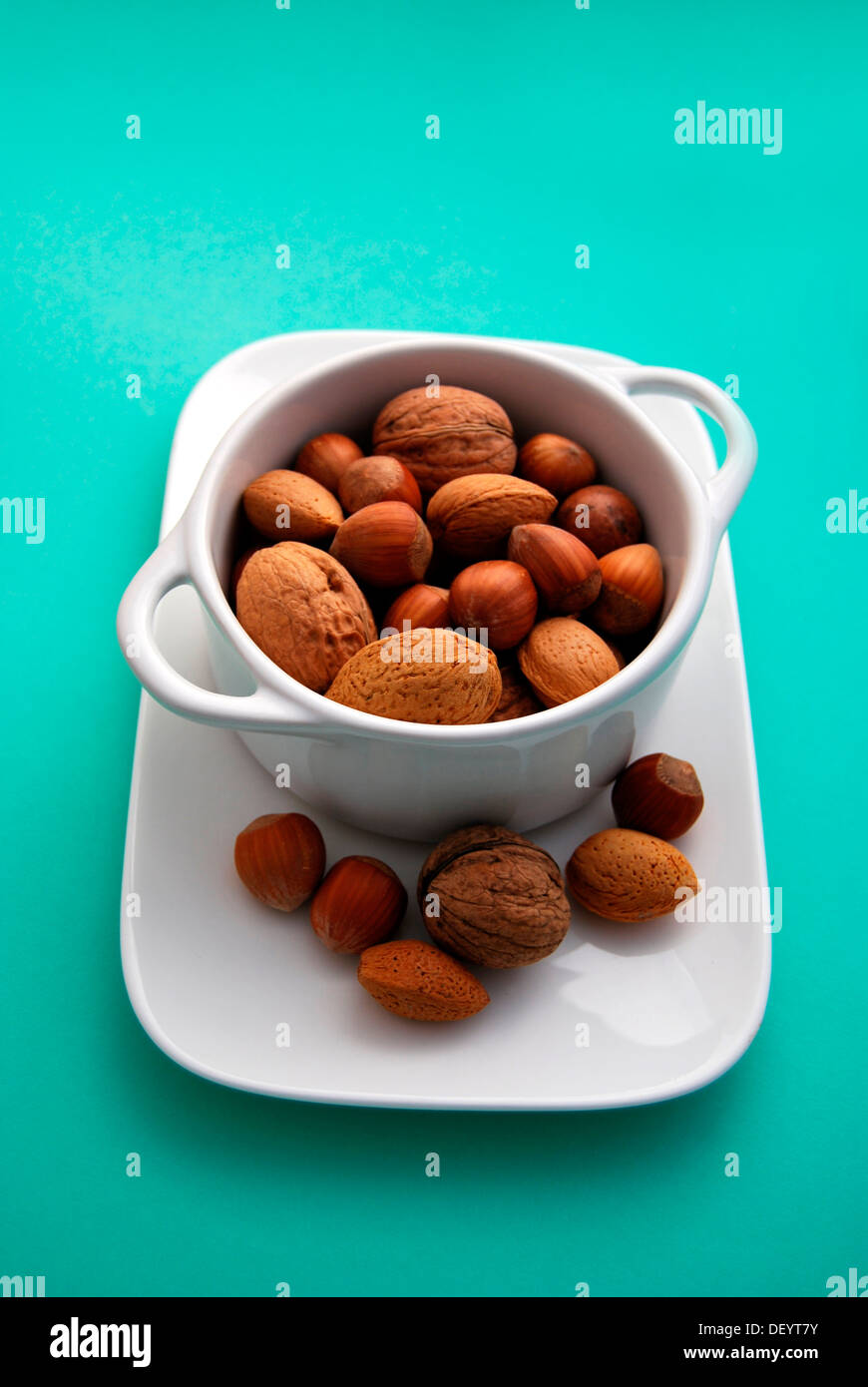 Soup bowl filled with various nuts, walnuts, almonds, hazelnuts Stock ...