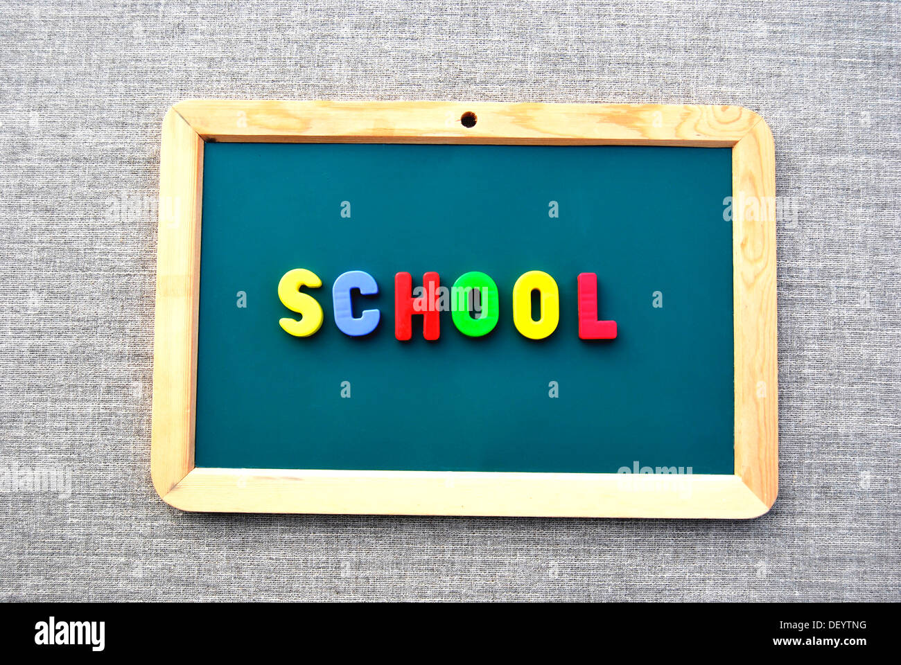 School, written in colourful magnetic letters on a school board Stock ...