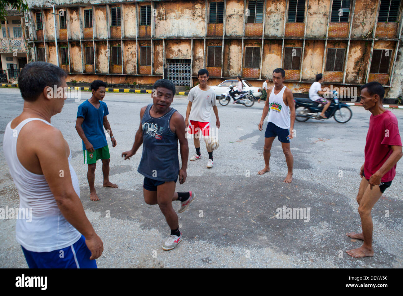 Men practice Chin Lone in Mawlamyine City Stock Photo - Alamy