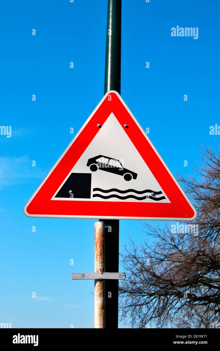 Warning sign, quay side or riverbank Stock Photo - Alamy