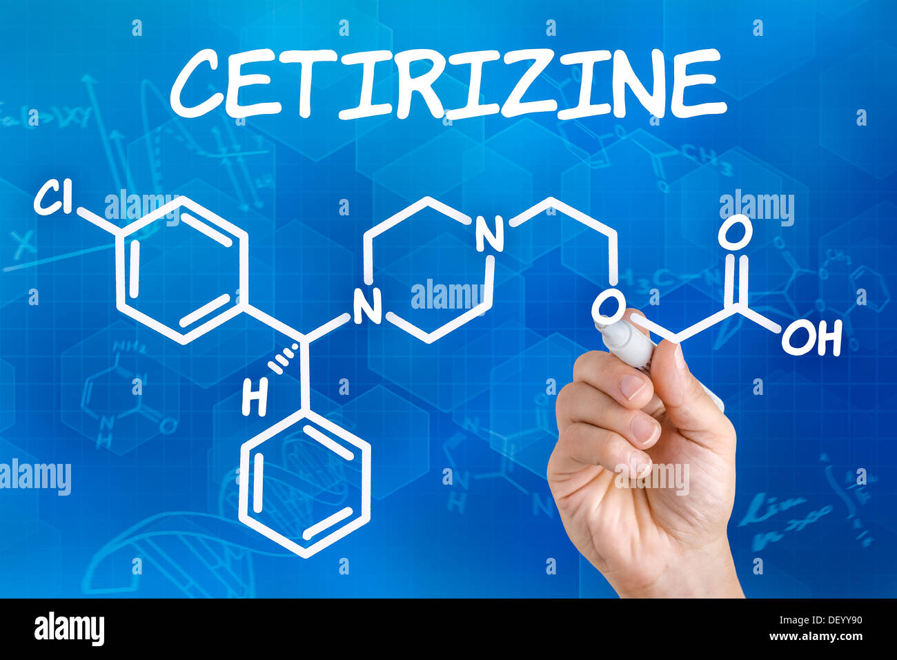 Hand with pen drawing the chemical formula of cetirizine Stock Photo ...