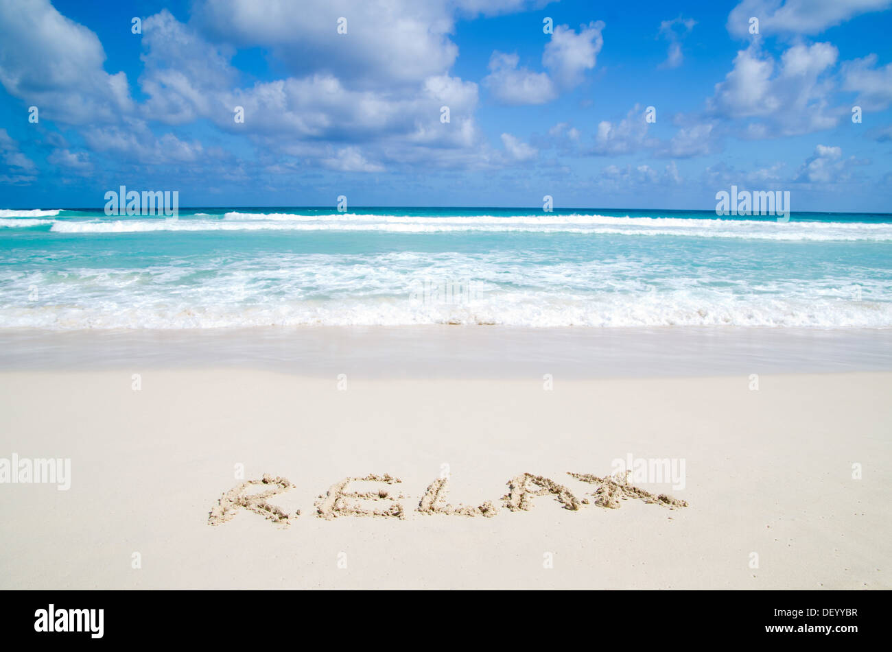 relax writing on the beach Stock Photo - Alamy