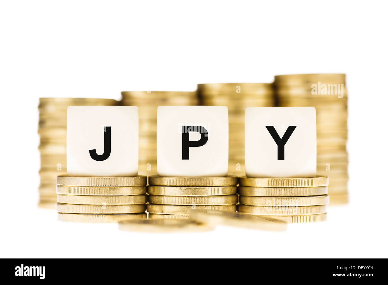 JPY (Japanese Currency) on Gold Coin Stacks Isolated on White Stock ...