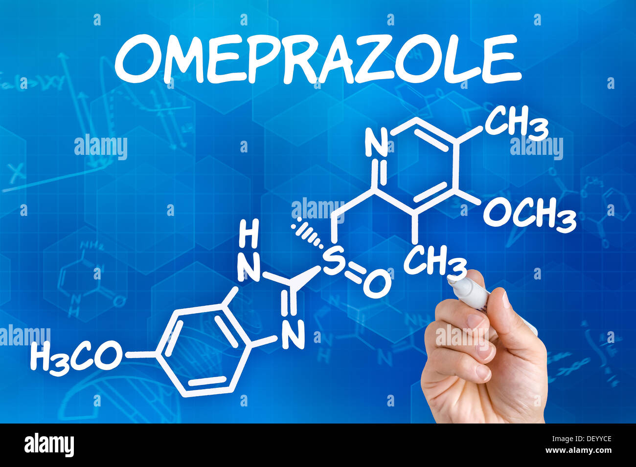 Hand with pen drawing the chemical formula of omeprazole Stock Photo ...