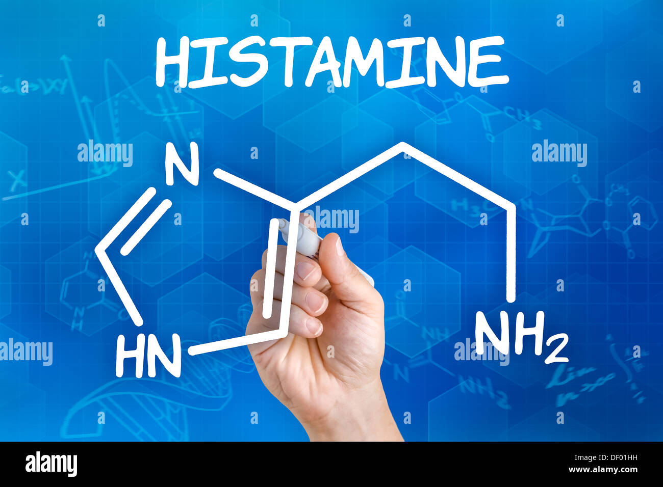 Hand with pen drawing the chemical formula of histamine Stock Photo - Alamy