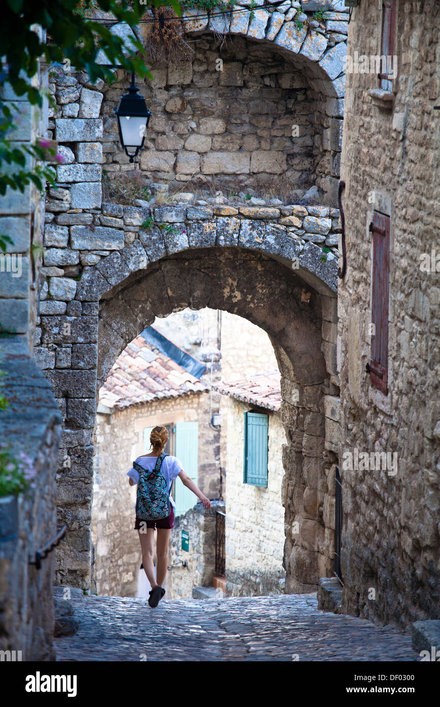 Stone arc in an alleyway, Lacoste village, Vaucluse, Provence, France ...