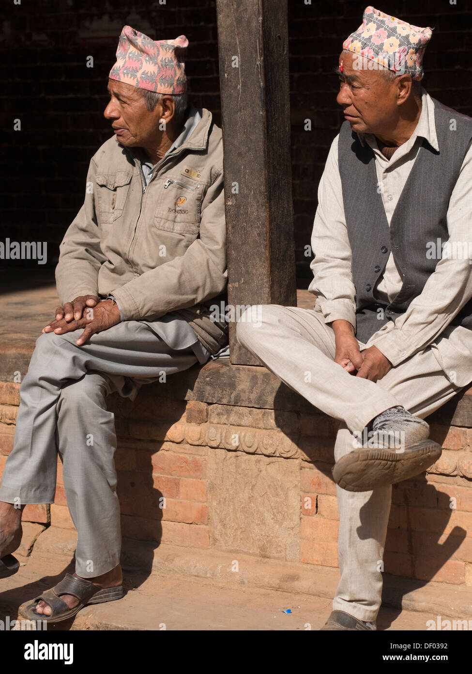 Two older men sit hi-res stock photography and images - Alamy
