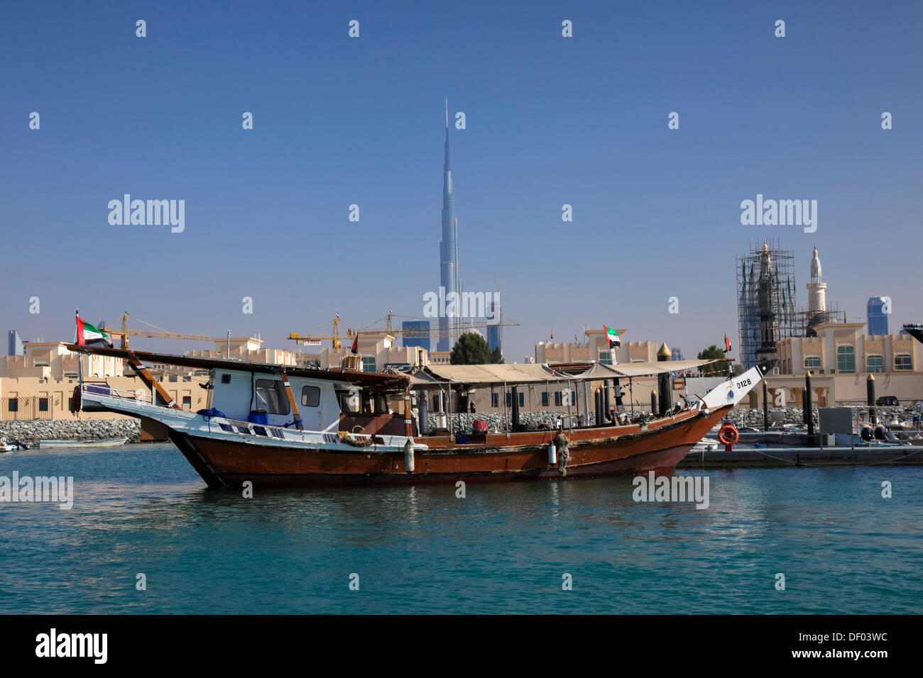 Traditional Dhow, Burj Khalifa at back, Dubai, Emirate of Dubai, United ...