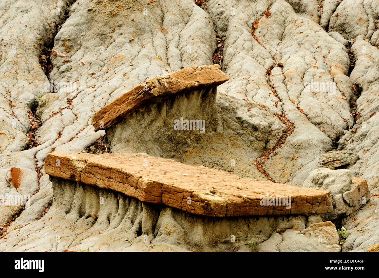 Bentonite hill details showing erosion gullies and cap rocks Stock ...