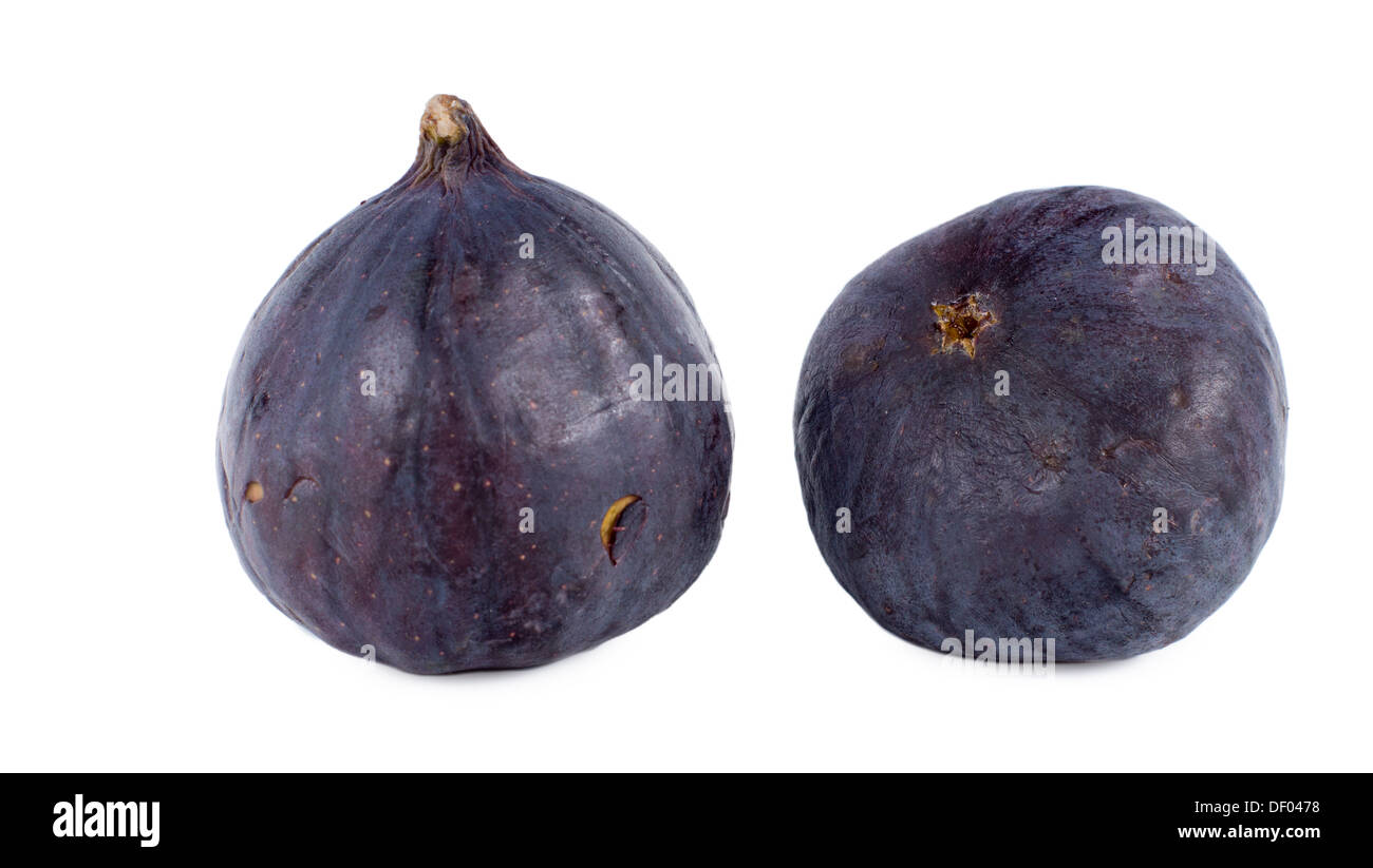Two whole fresh juicy purple figs isolated on white in two different ...