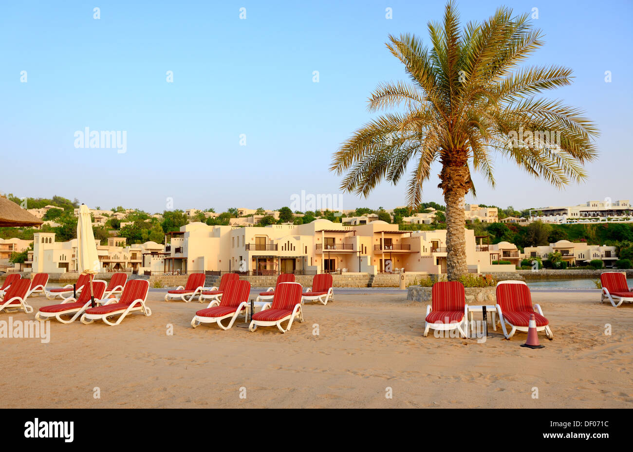 Beach of the luxury hotel during sunset, Ras Al Khaima, UAE Stock Photo ...
