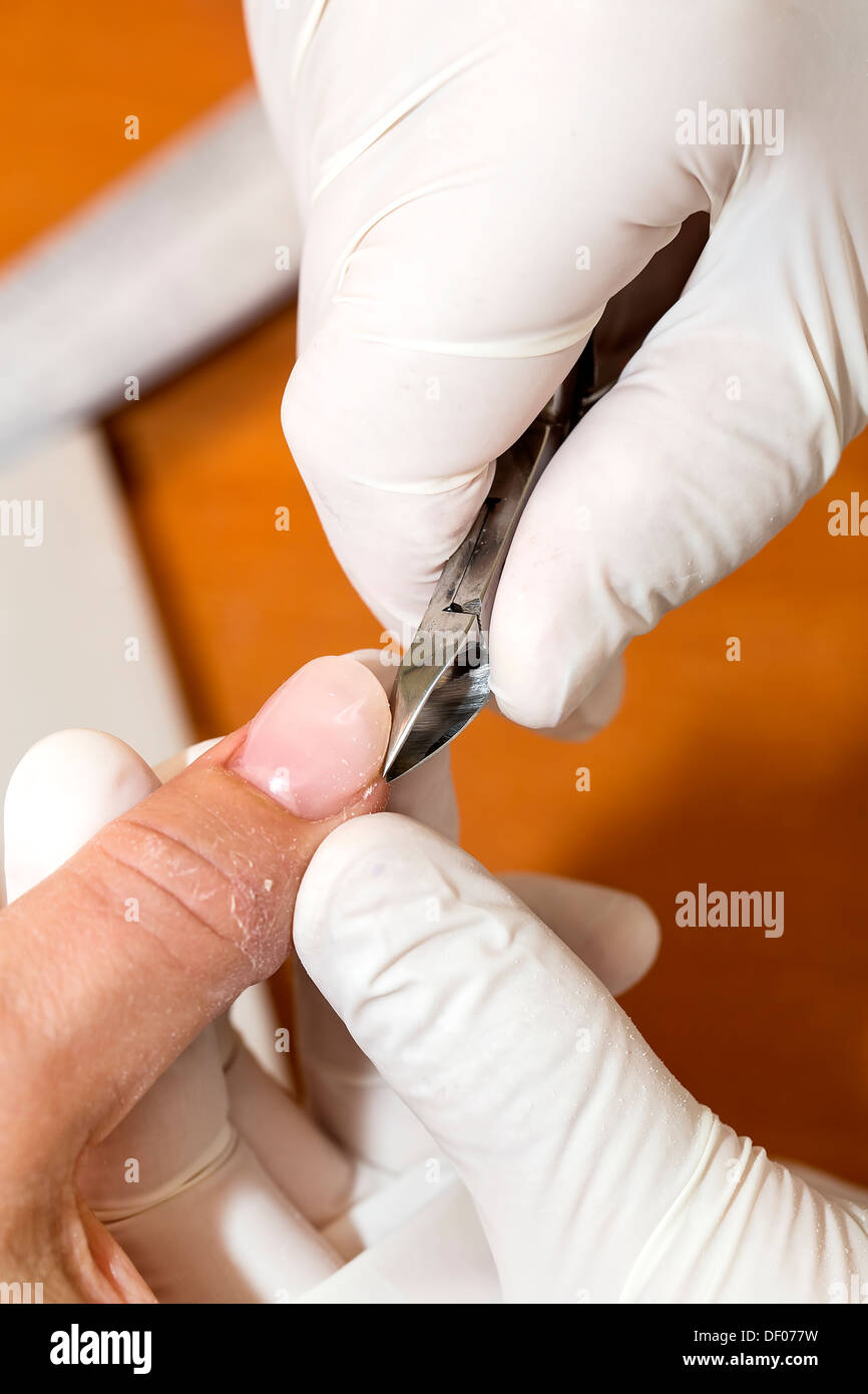 processes work on a manicure in the salon Stock Photo - Alamy