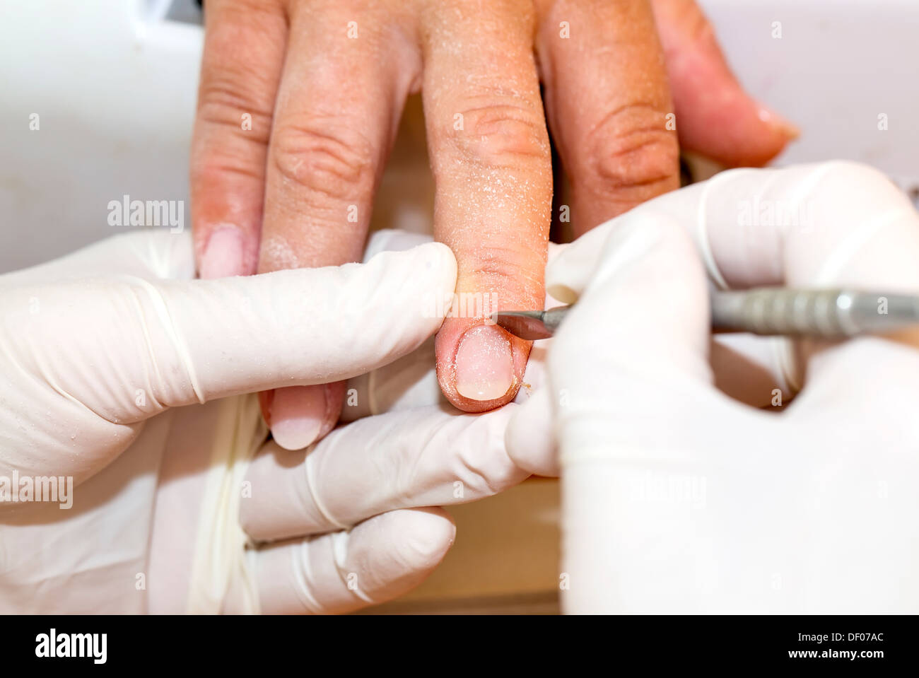 processes work on a manicure in the salon Stock Photo - Alamy