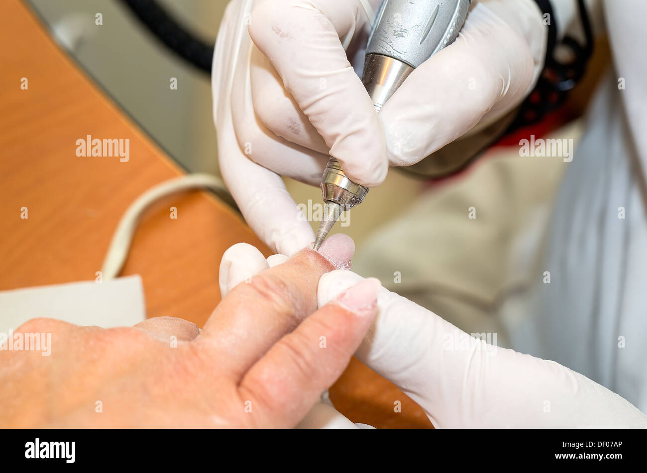 processes work on a manicure in the salon Stock Photo - Alamy
