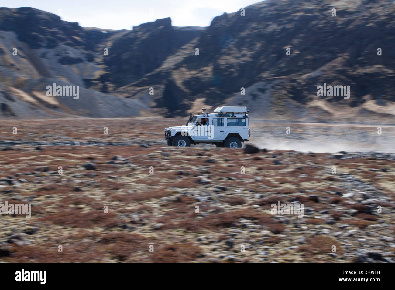 Defender driving in Iceland Stock Photo - Alamy
