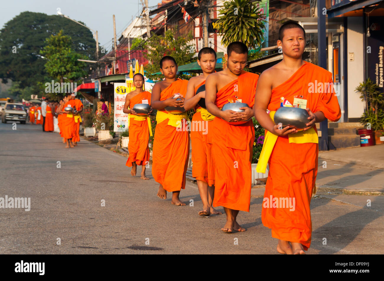 Morning alms round, young Buddhist monks from a monastery school Stock ...