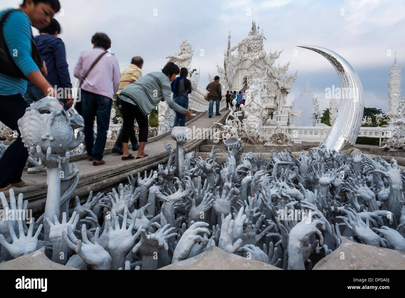 Sculpture of the creatures of hell, sacrificial offerings, Wat Rong ...