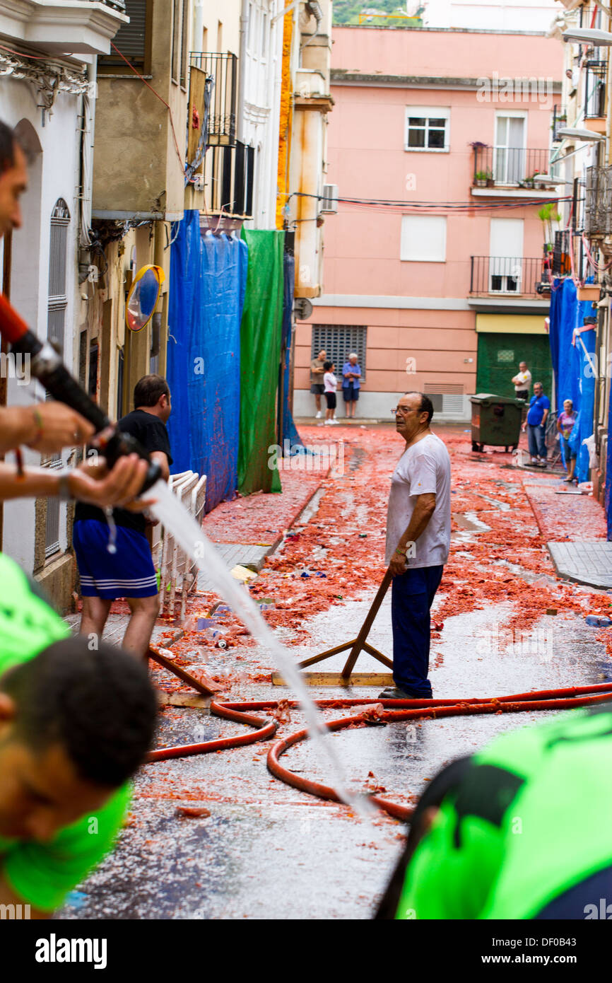 The cleanup after Tomatina Stock Photo - Alamy