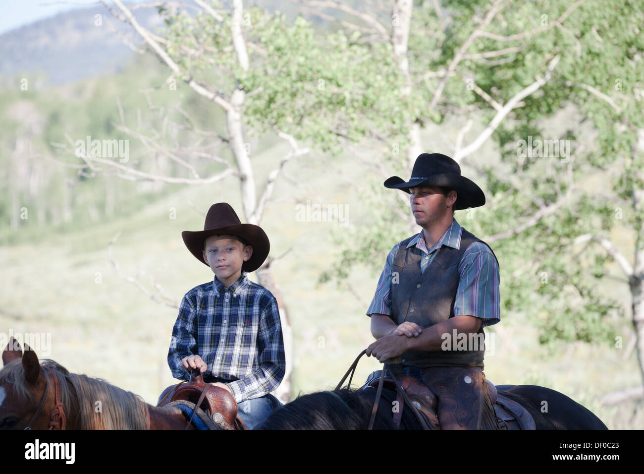 Father son horse riding hi-res stock photography and images - Alamy