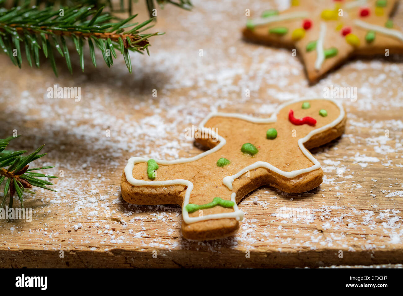 Gingerbread Man under a sprig of spruce Stock Photo - Alamy