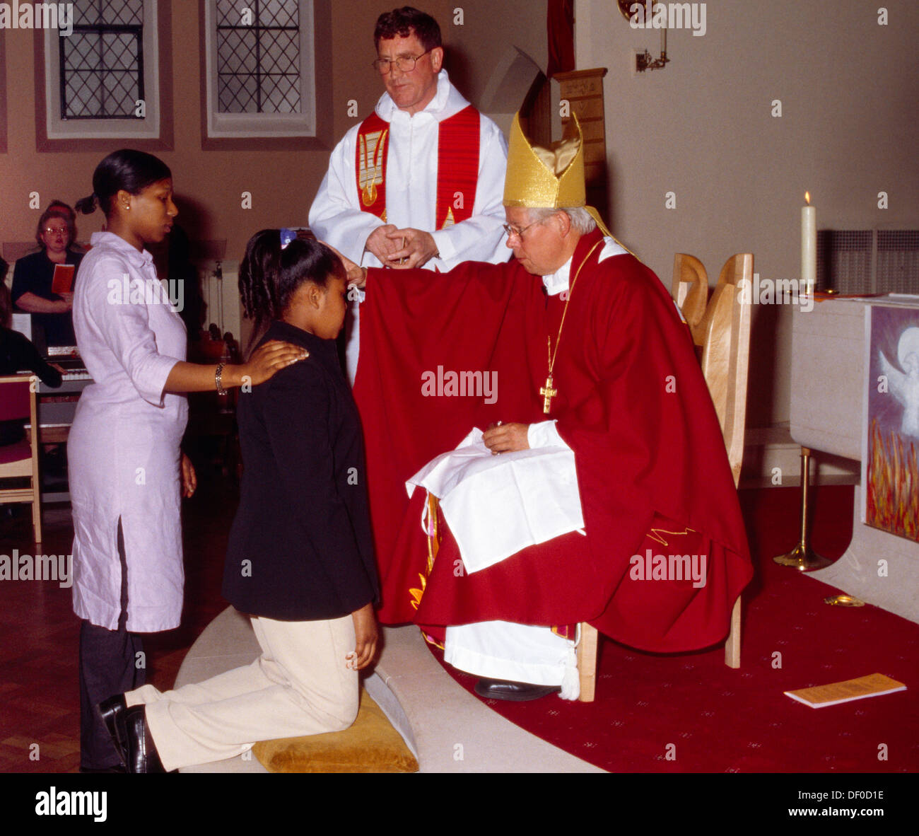 Annointing catholic hi-res stock photography and images - Alamy