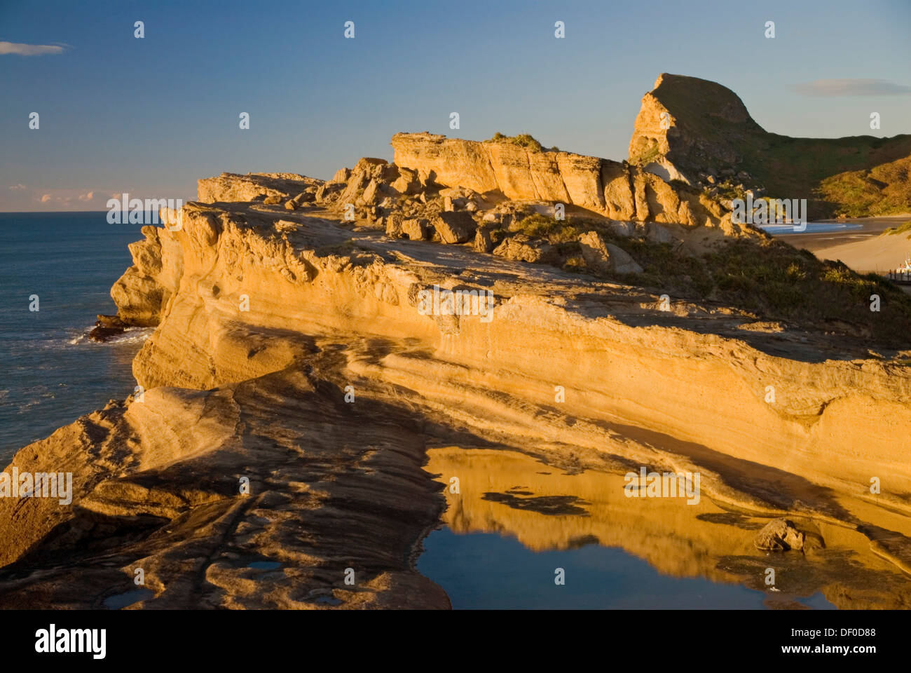 The cliffs at Castle Point and a tide pool at the Wairarapa Coast, New ...