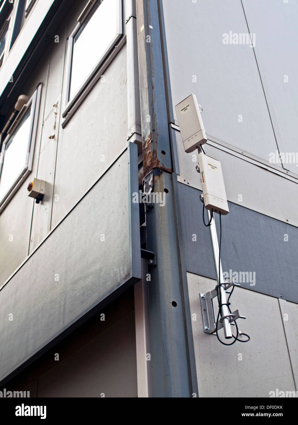 Wireless CPE (customer premises equipment) installed on building at ...