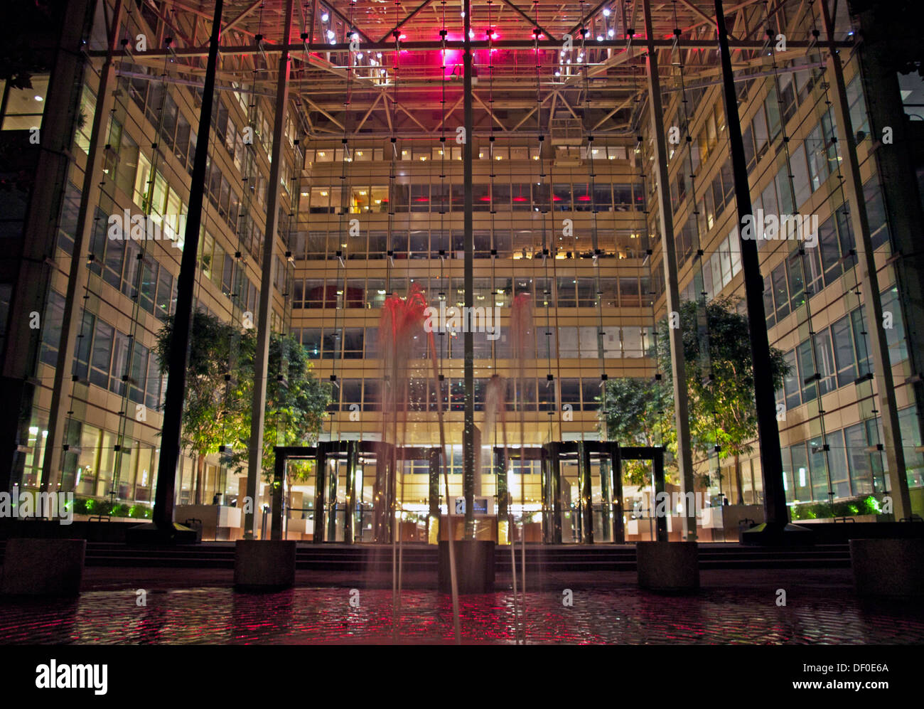 Night view of fountain in front of modern office building, Southbank ...