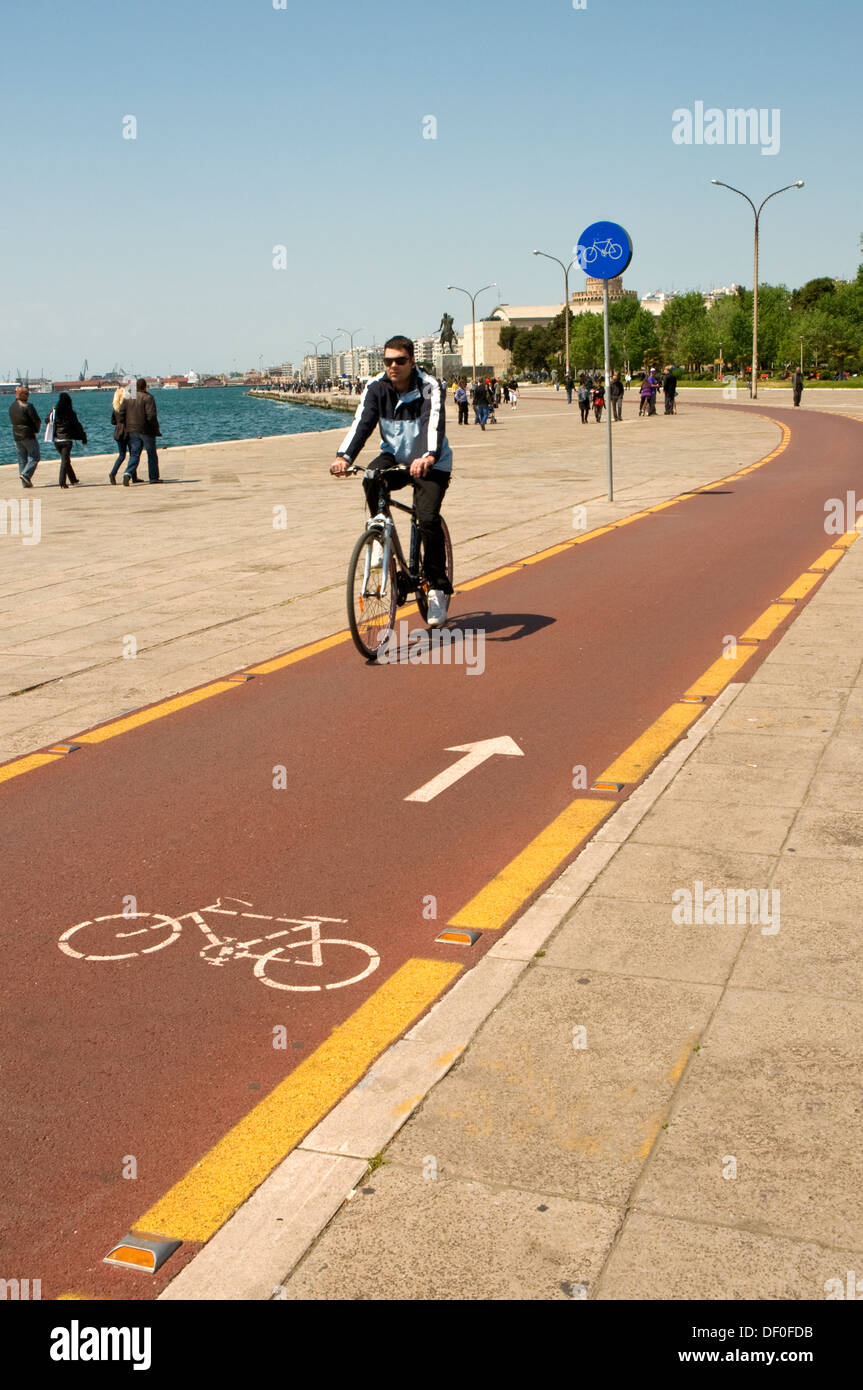 EUROPE, Greece, Thessaloniki, cyclist in cycle lane on the promenade by ...