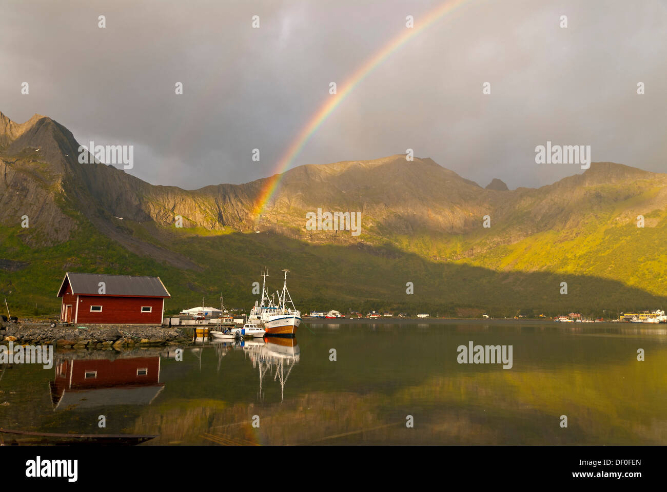 A rainbow over the Norwegian Sea near Grashopen and some fishing boats ...