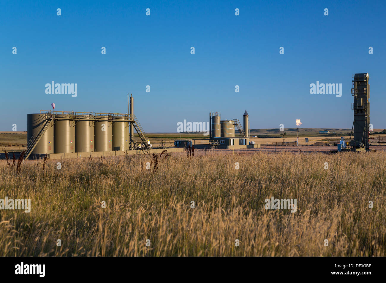 A modern oil pumper in the Bakken play oil fields near Williston, North ...