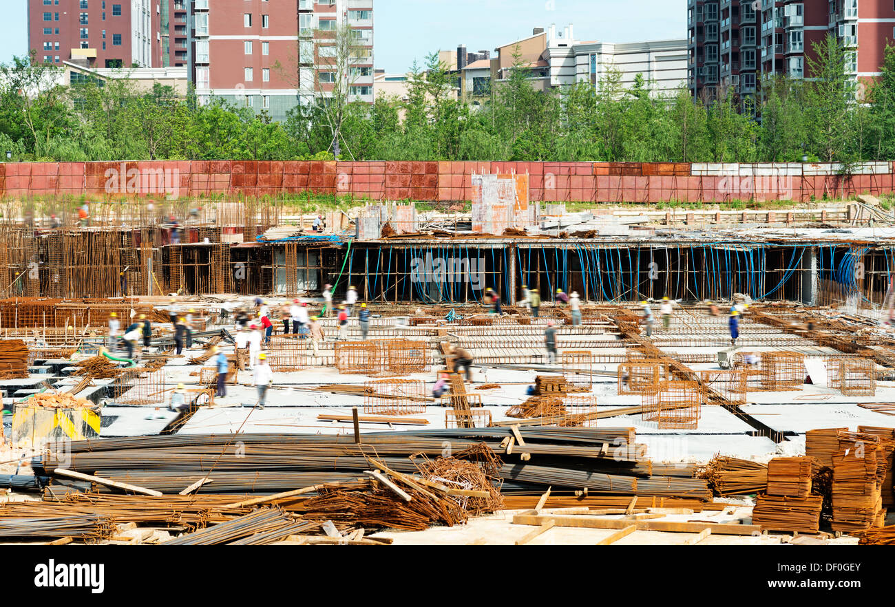 building under construction with workers Stock Photo - Alamy