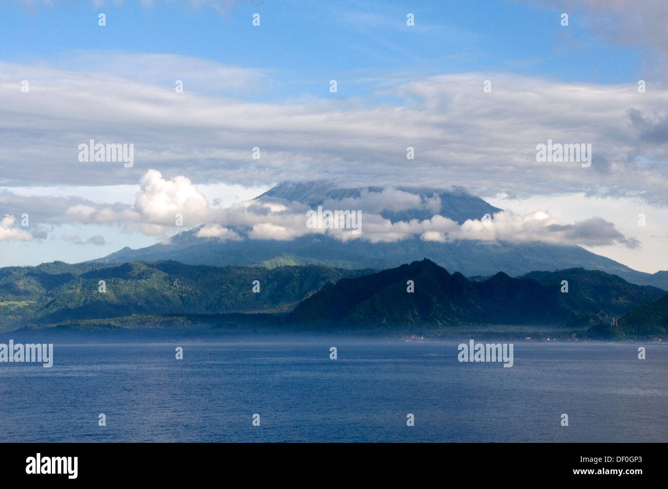 INDONESIA, Bali, volcano, Mt Gunung Agung, with clouds obscuring the ...