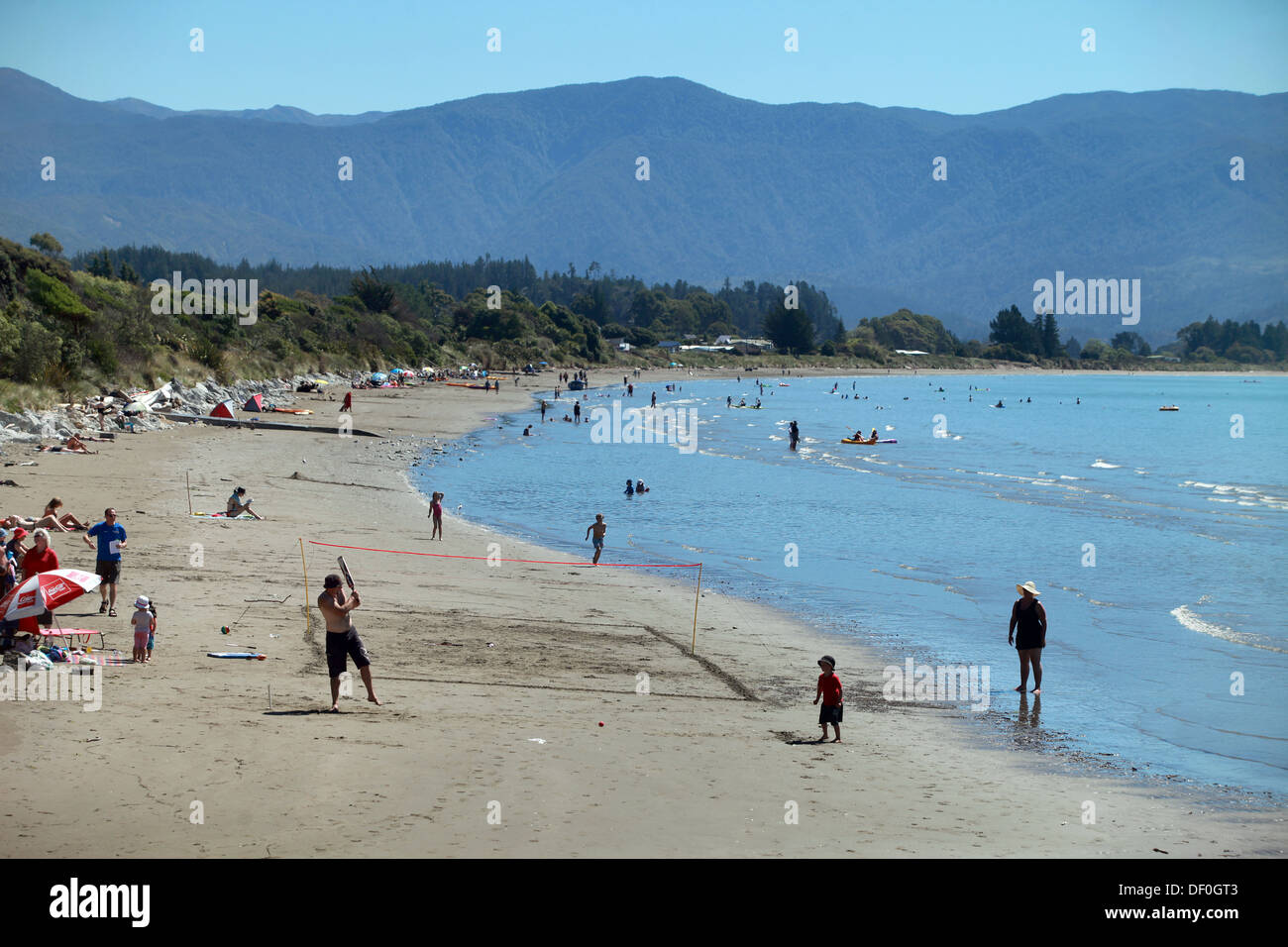 People enjoying the sunshine at Pohara beach, Golden Bay, Nelson, New ...