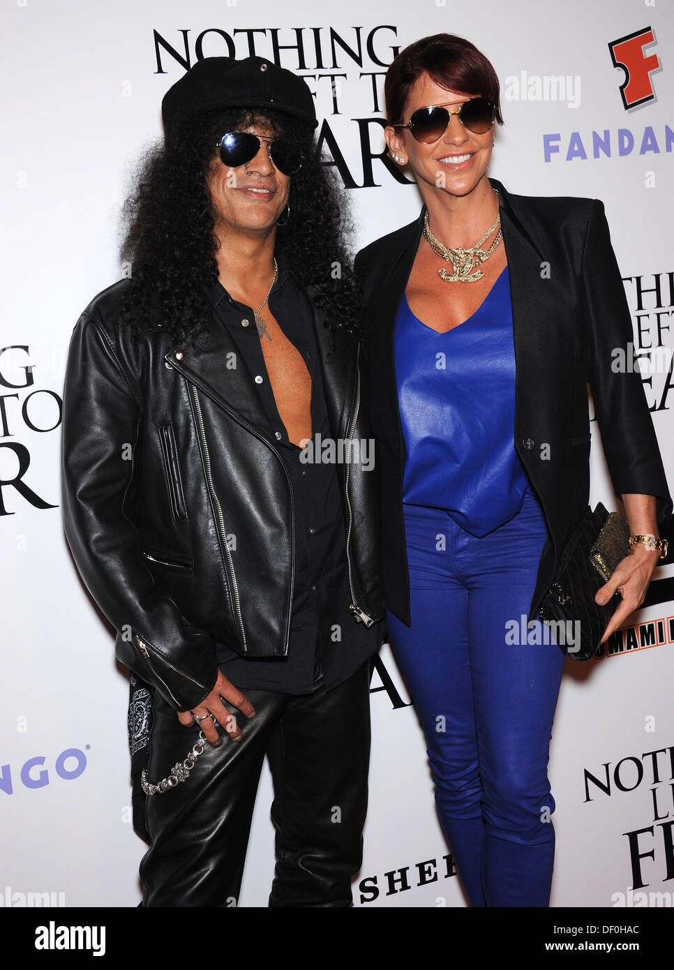 Hollywood, California, USA. 25th Sep, 2013. Slash & Perla Ferrar ...
