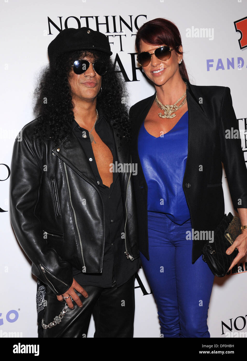 Hollywood, California, USA. 25th Sep, 2013. Slash & Perla Ferrar ...