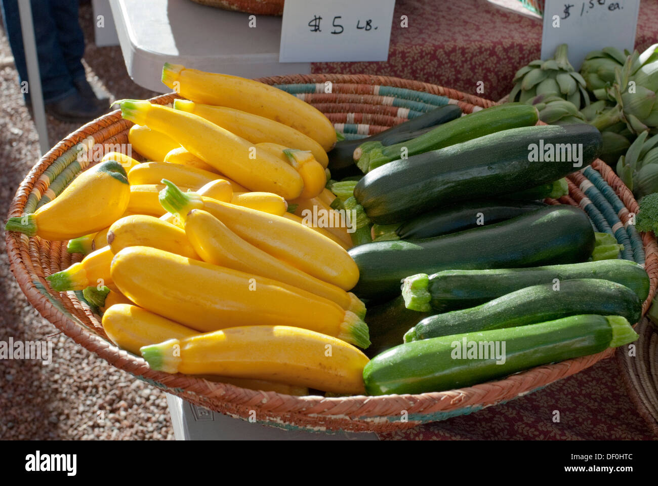 Summer squash and zucchini are just two of the vegetables for sale at ...