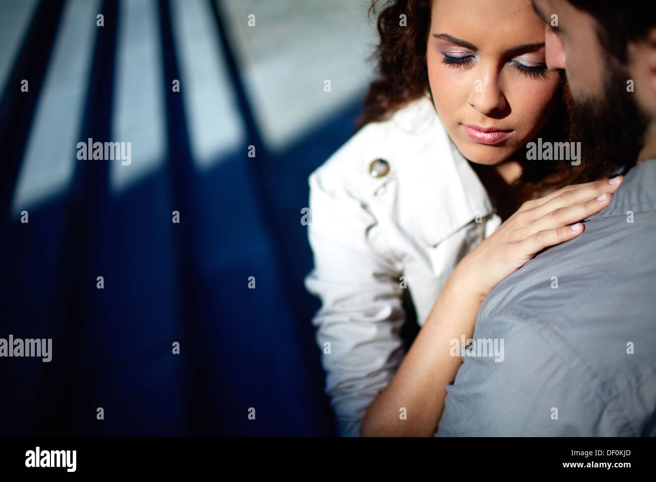 Portrait of affectionate female embracing her sweetheart Stock Photo ...