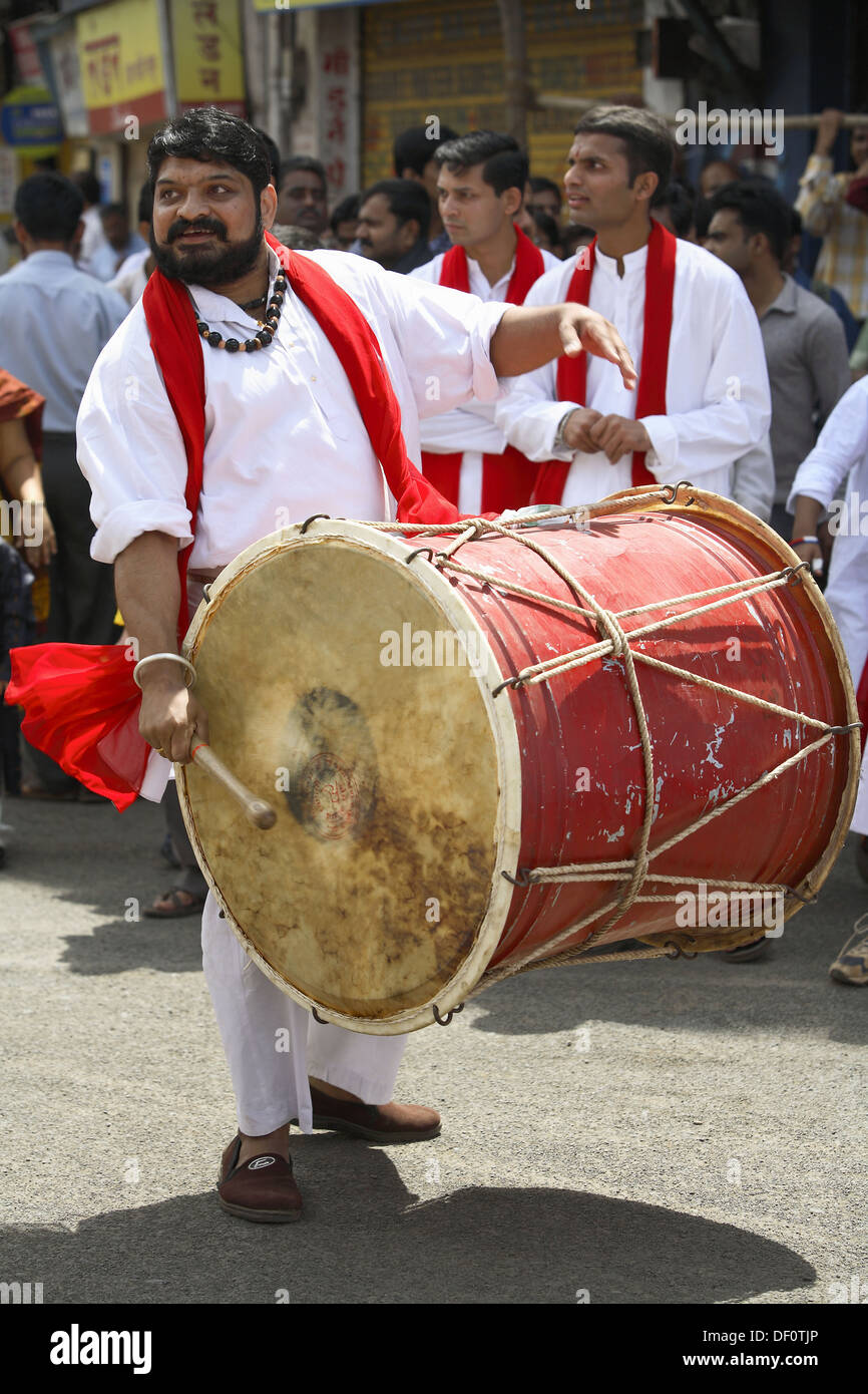 Man beating a drum hi-res stock photography and images - Alamy