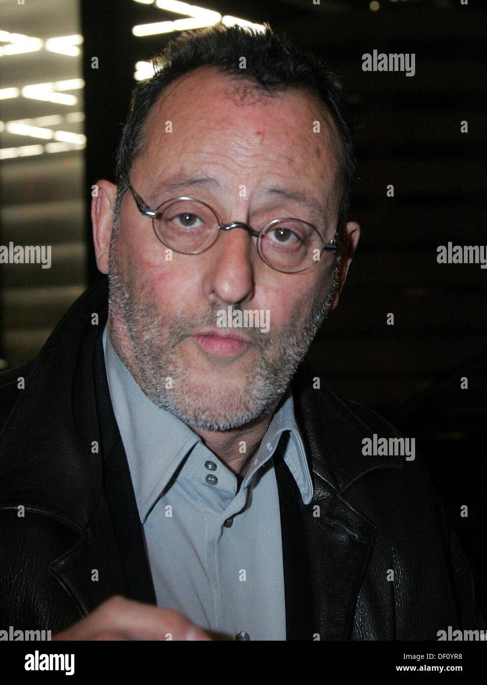 Actor Jean Reno enters the Ritz Carlton Hotel in Berlin Stock Photo - Alamy